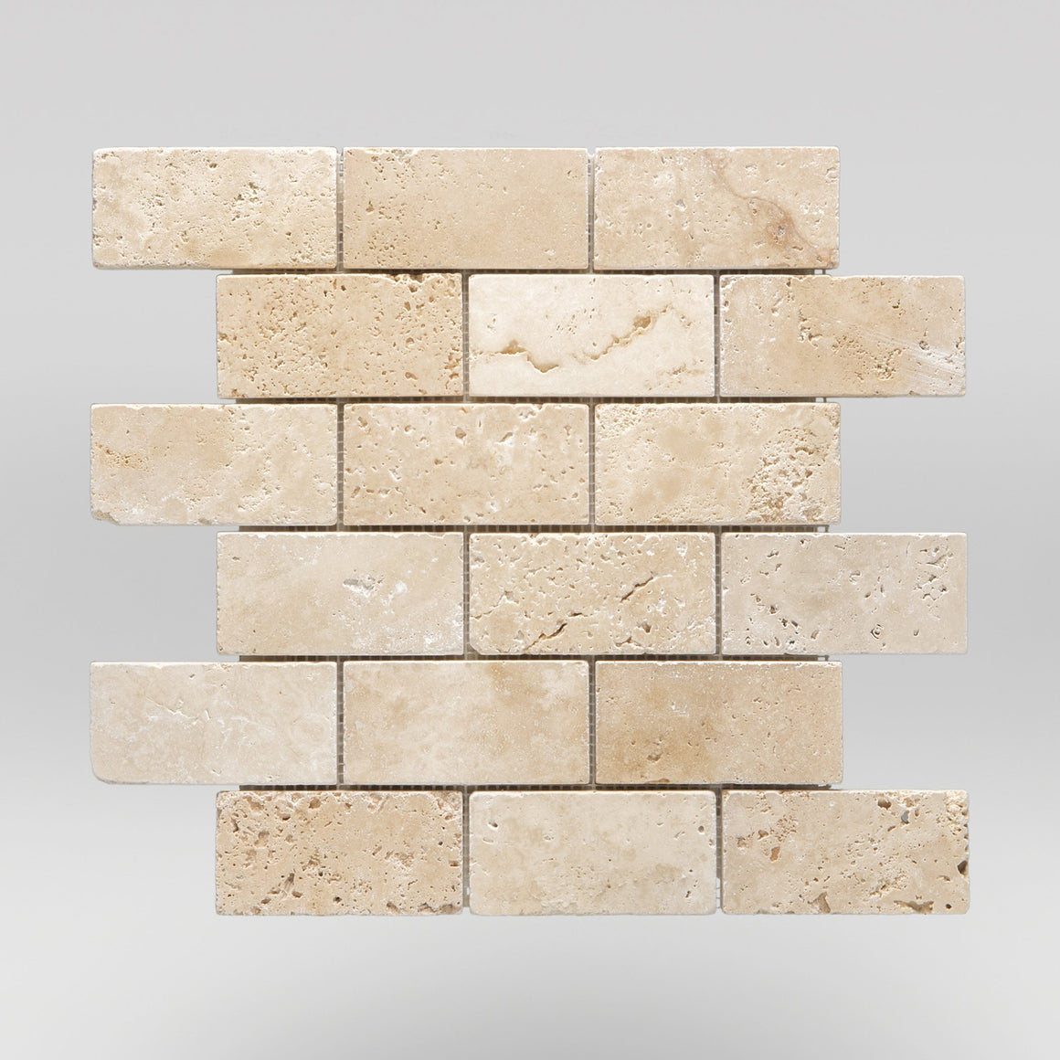 Ivory (White) Travertine Tumbled 2"x4" Mosaic - BigAppleMarble.com